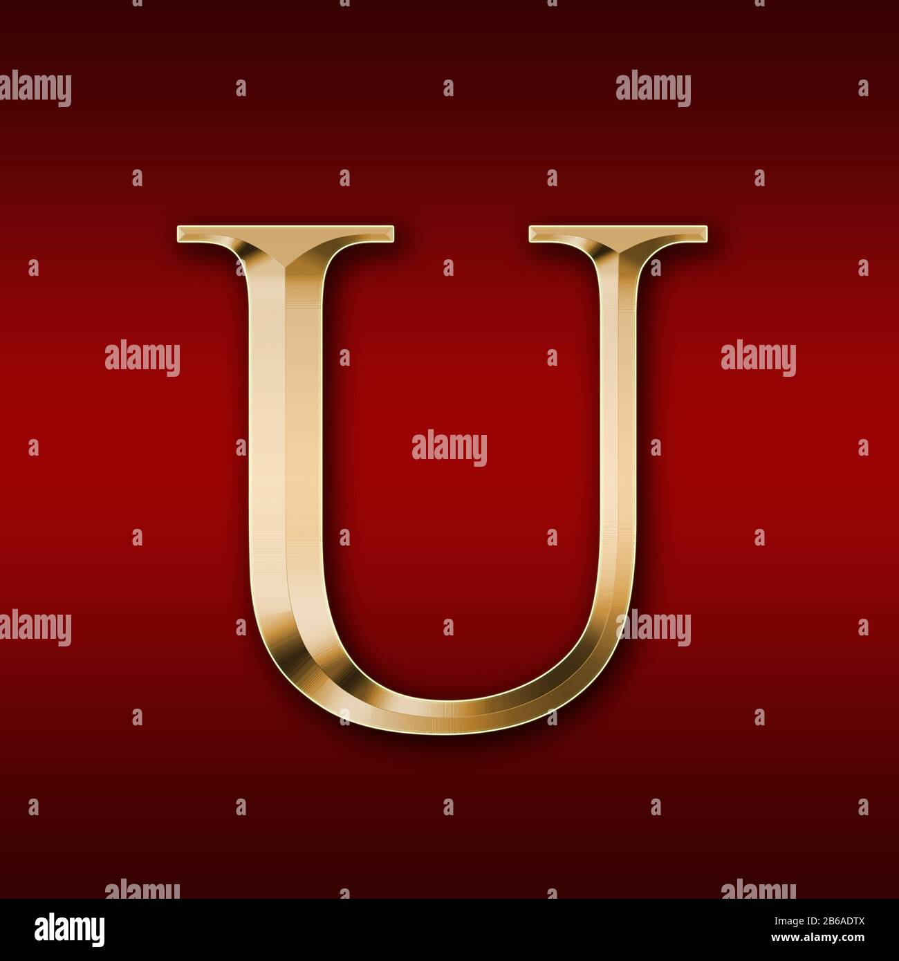 Gold letter "U" on a red background Stock Photo - Alamy
