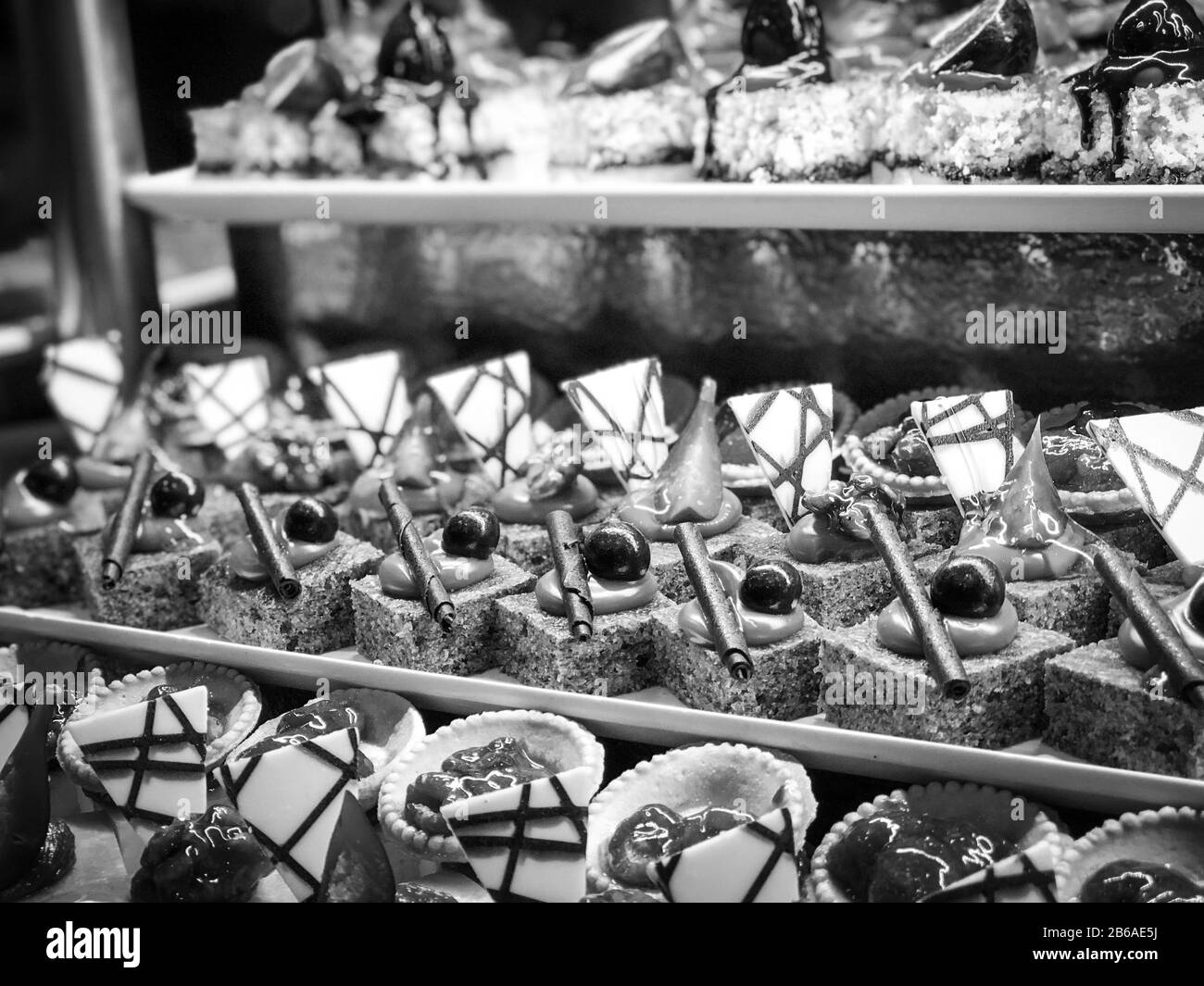 mix mini cakes & sweets with fresh fruits & glazed topping Stock Photo ...