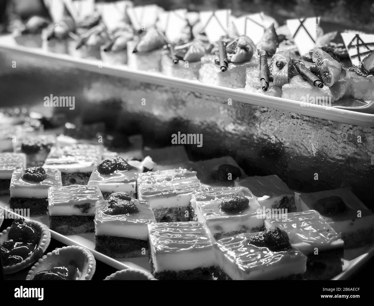 mix mini cakes & sweets with fresh fruits & glazed topping Stock Photo ...