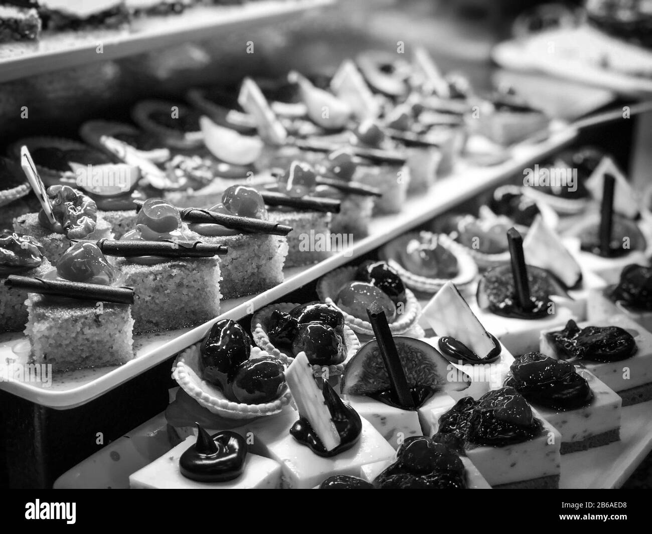 mix mini cakes & sweets with fresh fruits & glazed topping Stock Photo ...