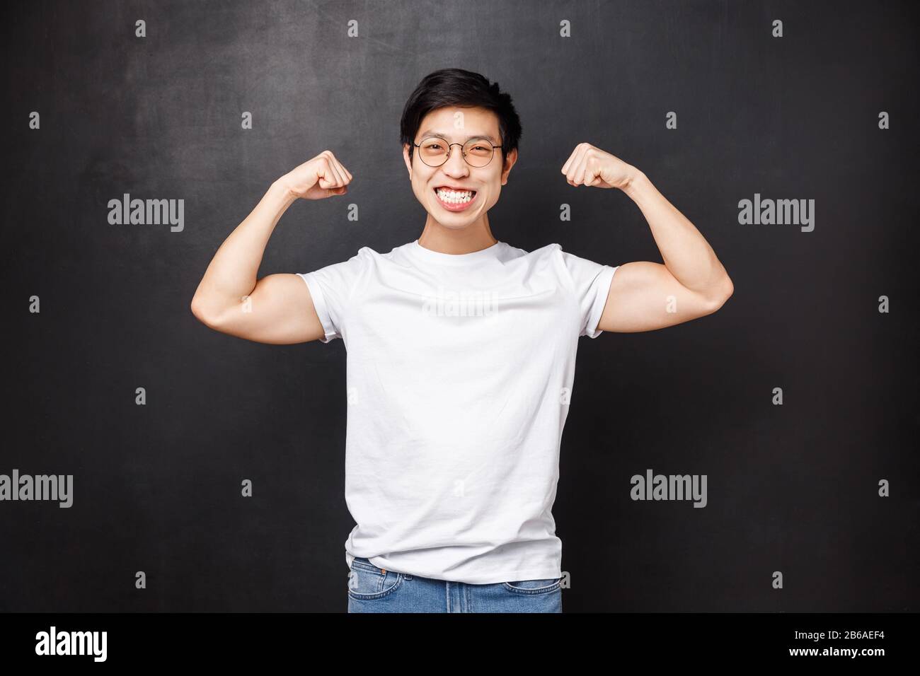 Sport, athletes and olimpics concept. Cheerful and strong young ...