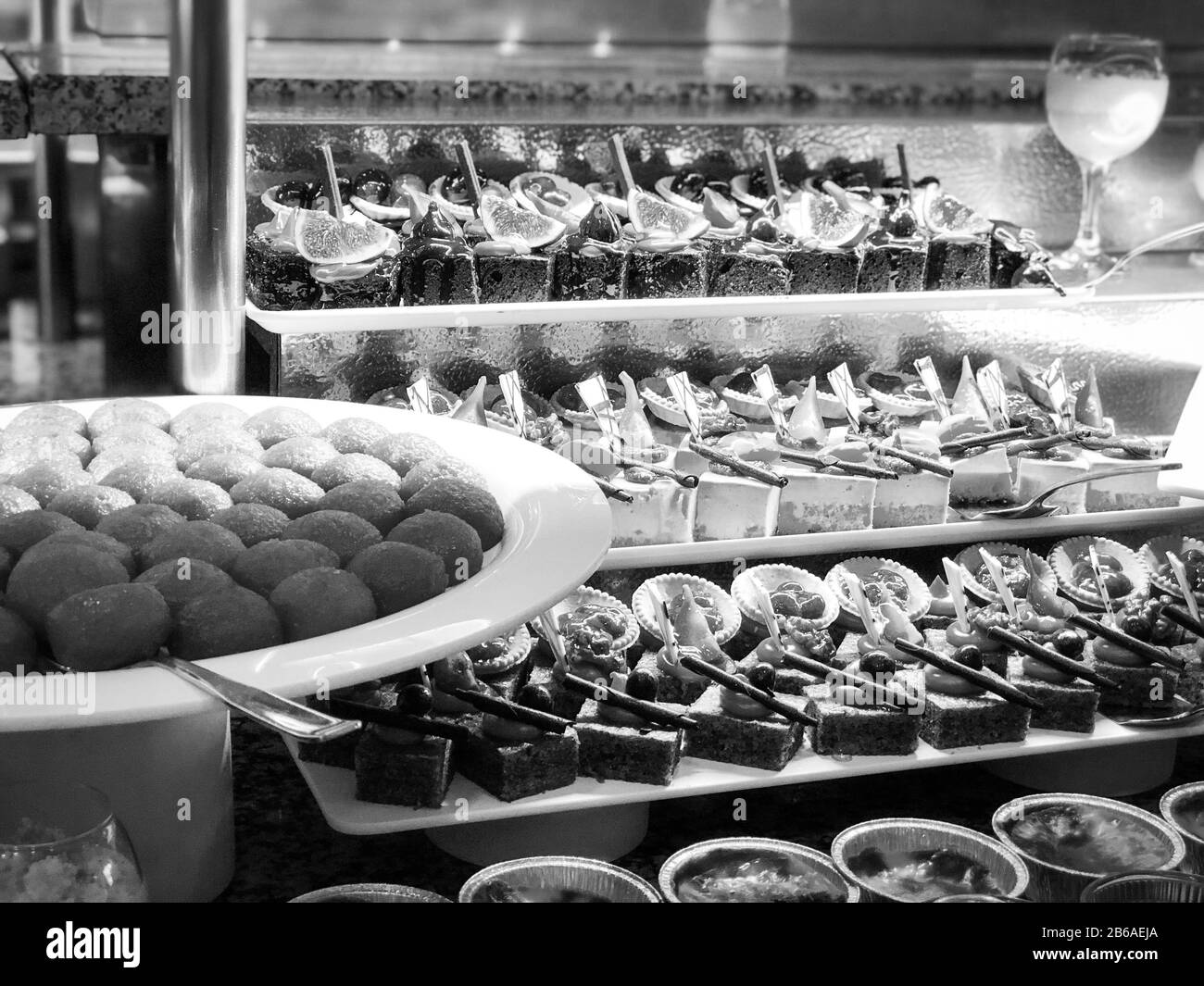 mix mini cakes & sweets with fresh fruits & glazed topping Stock Photo ...