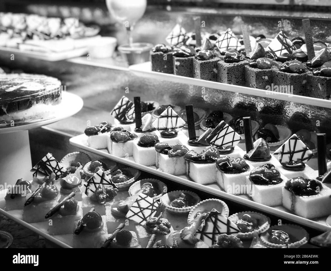 mix mini cakes & sweets with fresh fruits & glazed topping Stock Photo ...