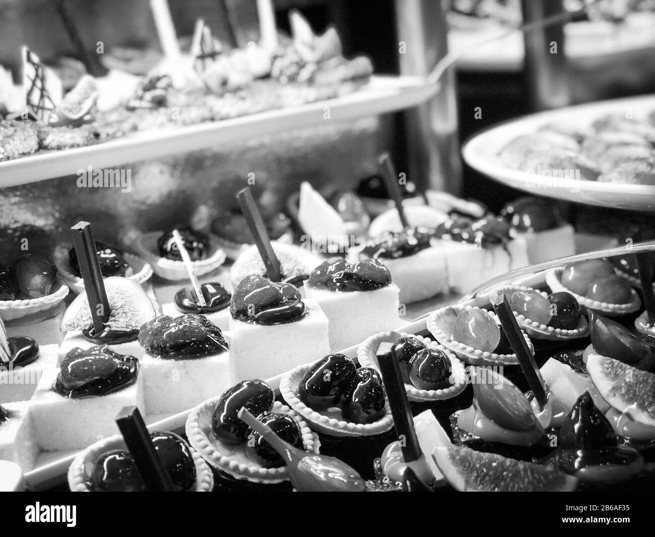 mix mini cakes & sweets with fresh fruits & glazed topping Stock Photo ...