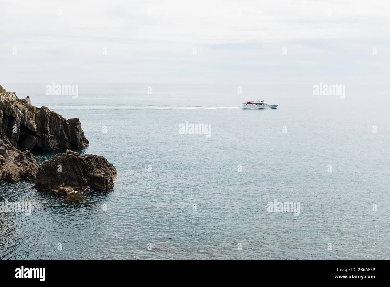 Beautiful seascape with ship going to the sea Stock Photo - Alamy