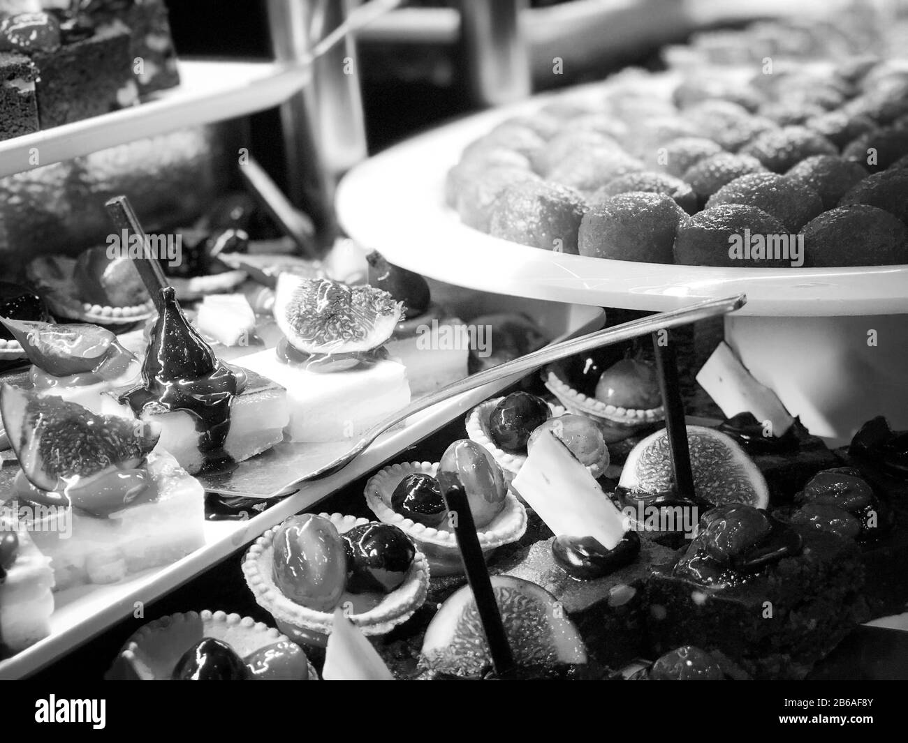 mix mini cakes & sweets with fresh fruits & glazed topping Stock Photo ...
