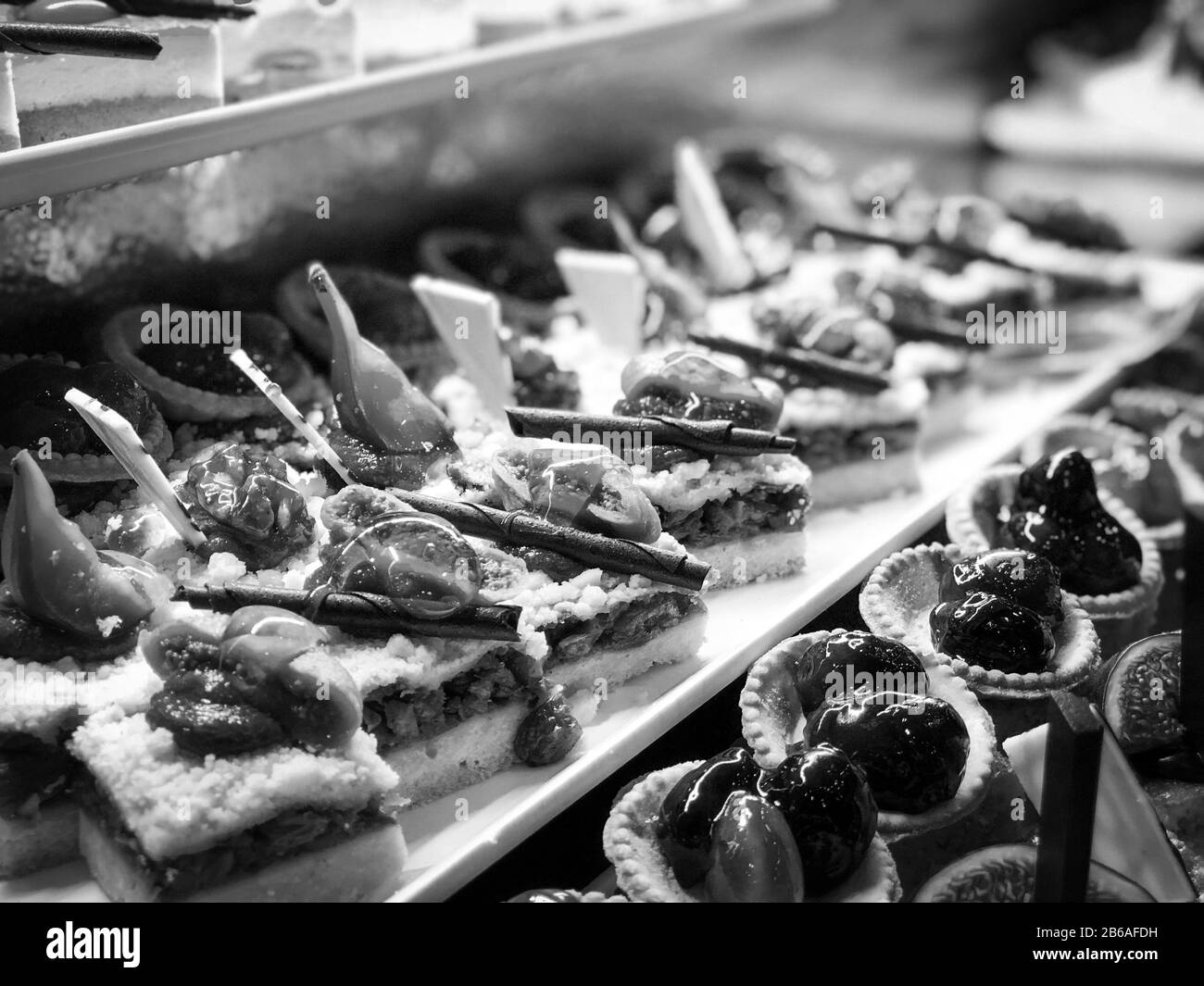 mix mini cakes & sweets with fresh fruits & glazed topping Stock Photo ...