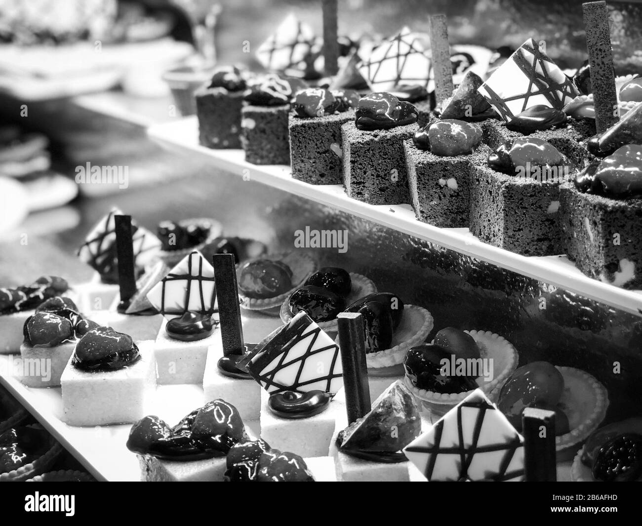 mix mini cakes & sweets with fresh fruits & glazed topping Stock Photo ...