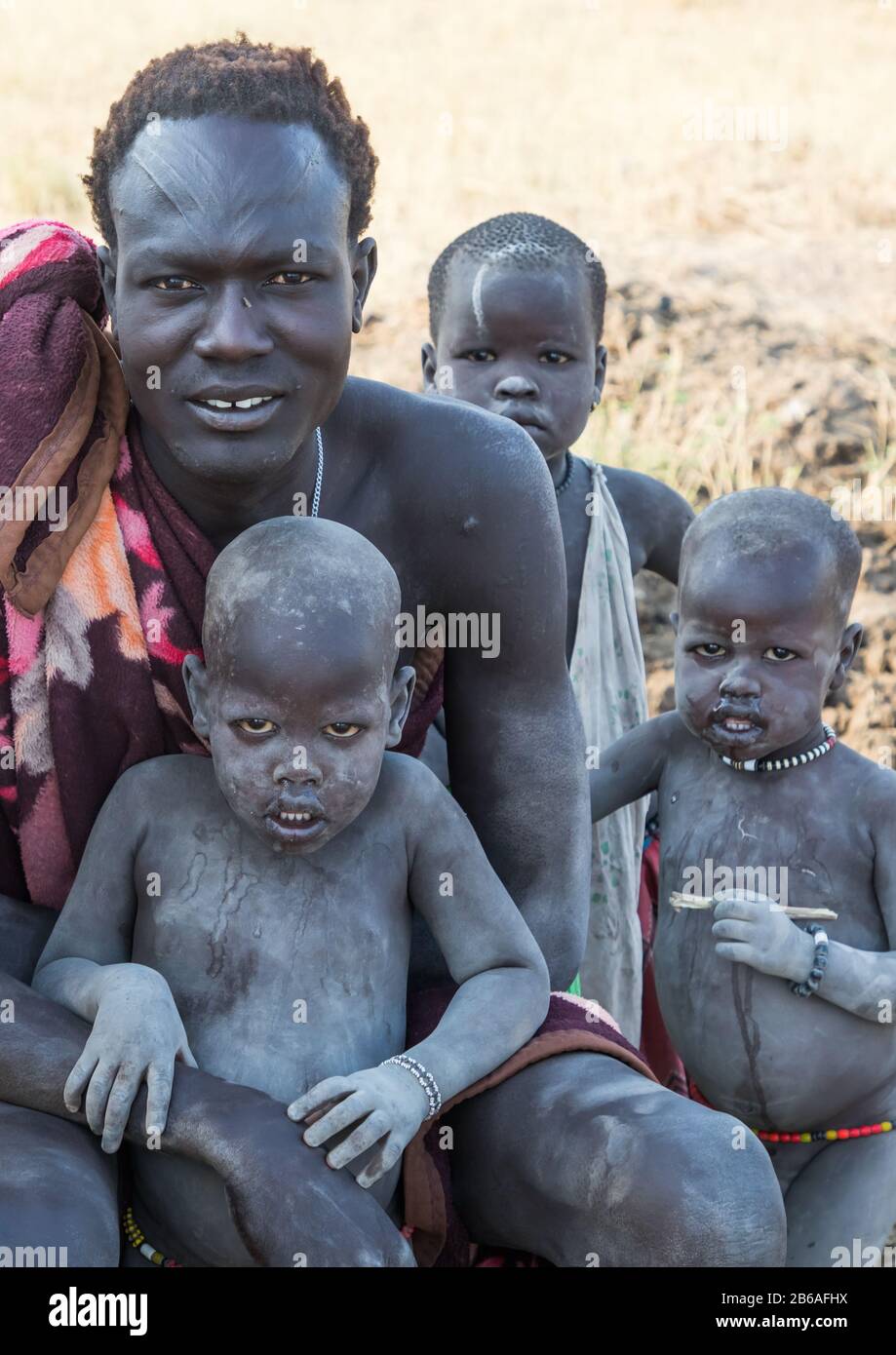 Mundari tribe father with his children, Central Equatoria, Terekeka ...