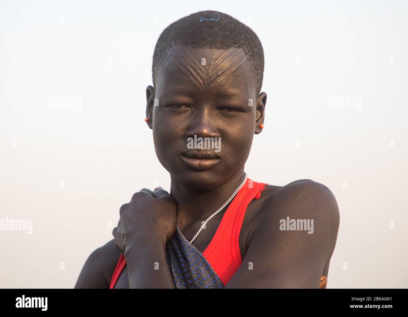 Portrait of a Mundari tribe woman with scarifications on the forehead, Central Equatoria ...