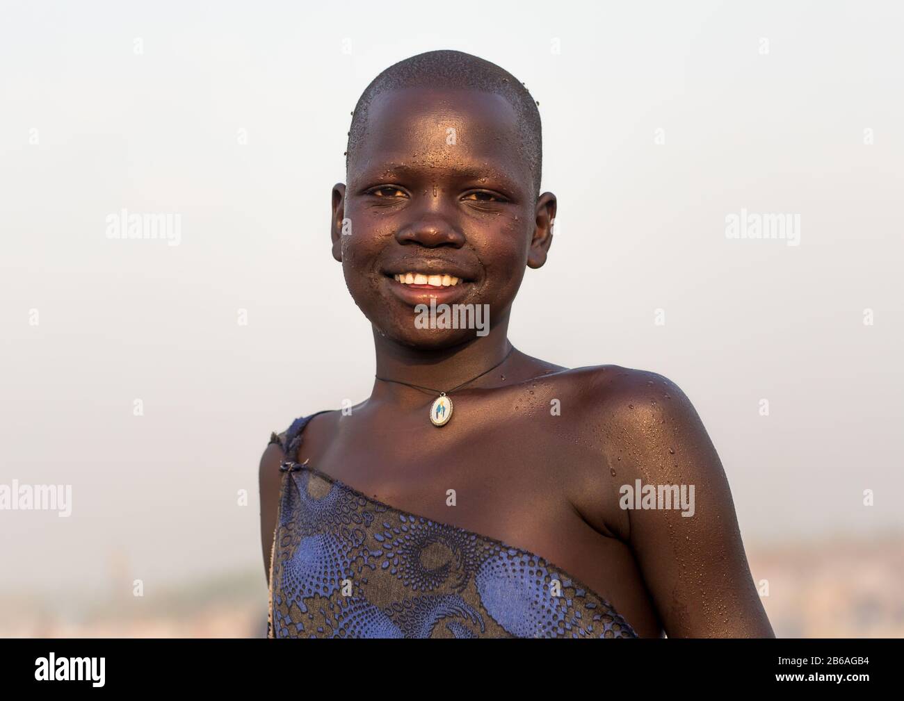 Portrait of a smiling Mundari tribe woman, Central Equatoria, Terekeka, South Sudan Stock Photo ...