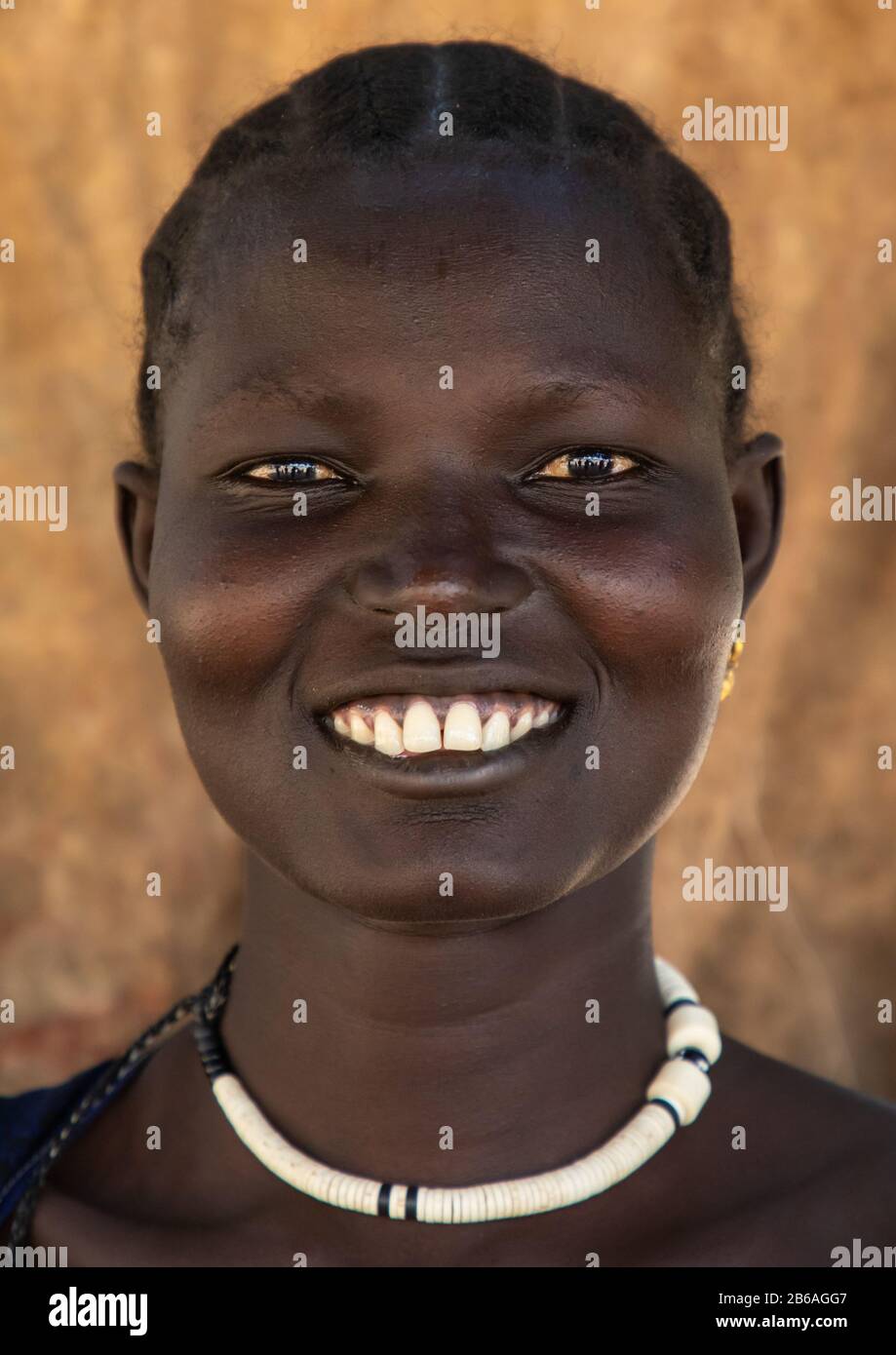 Portrait of a smiling Mundari tribe woman, Central Equatoria, Terekeka, South Sudan Stock Photo ...