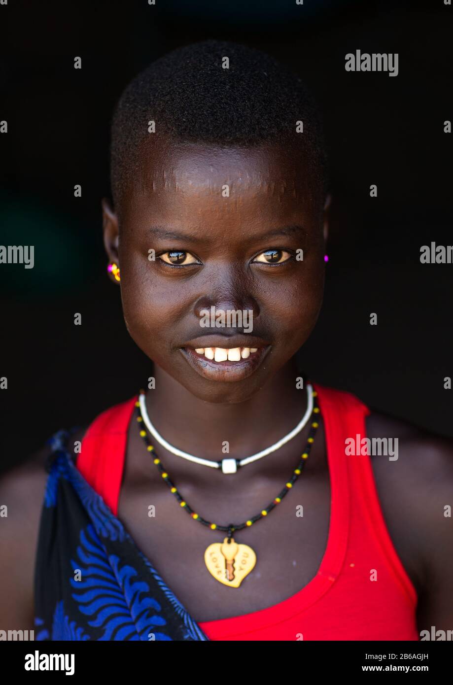 Portrait of a smiling Mundari young woman tribe, Central Equatoria, Terekeka, South Sudan Stock ...