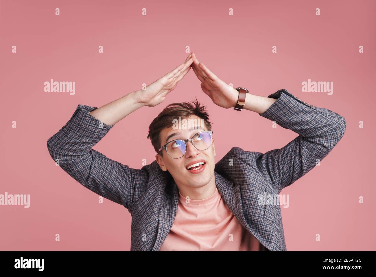 Hands above her head hi-res stock photography and images - Alamy