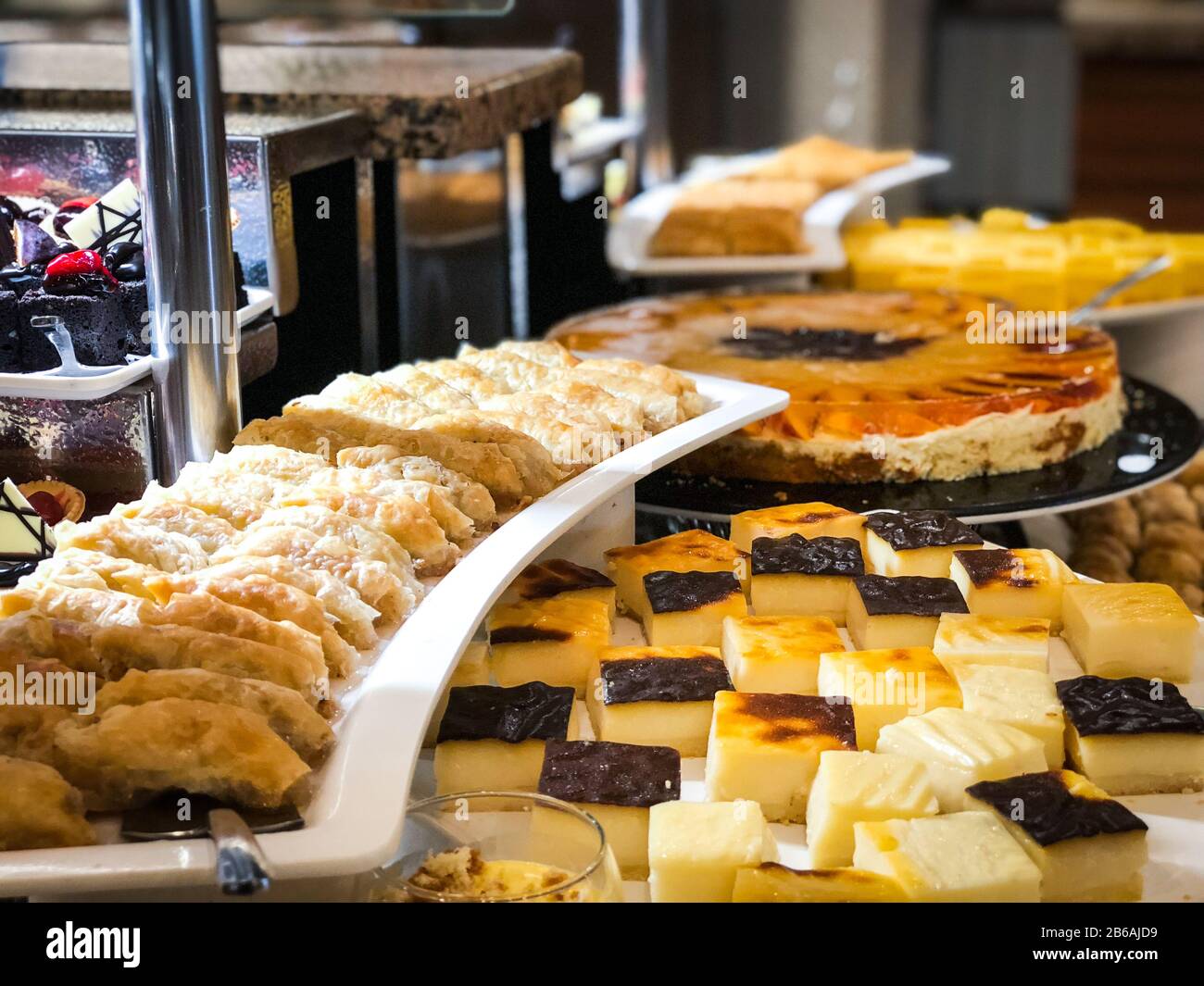 mix mini cakes & sweets with fresh fruits & glazed topping Stock Photo ...