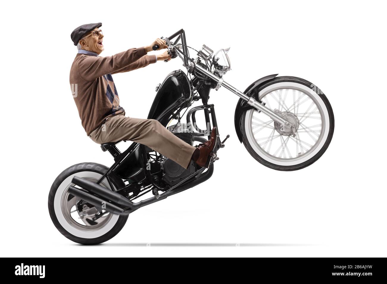 Grandfather riding a chopper motorbike on one wheel isolated on white ...