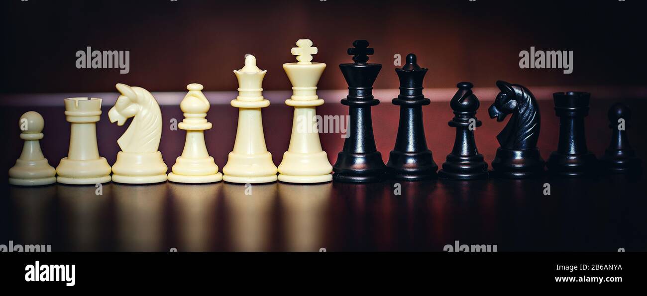 Chess pieces on a chessboard Stock Photo - Alamy
