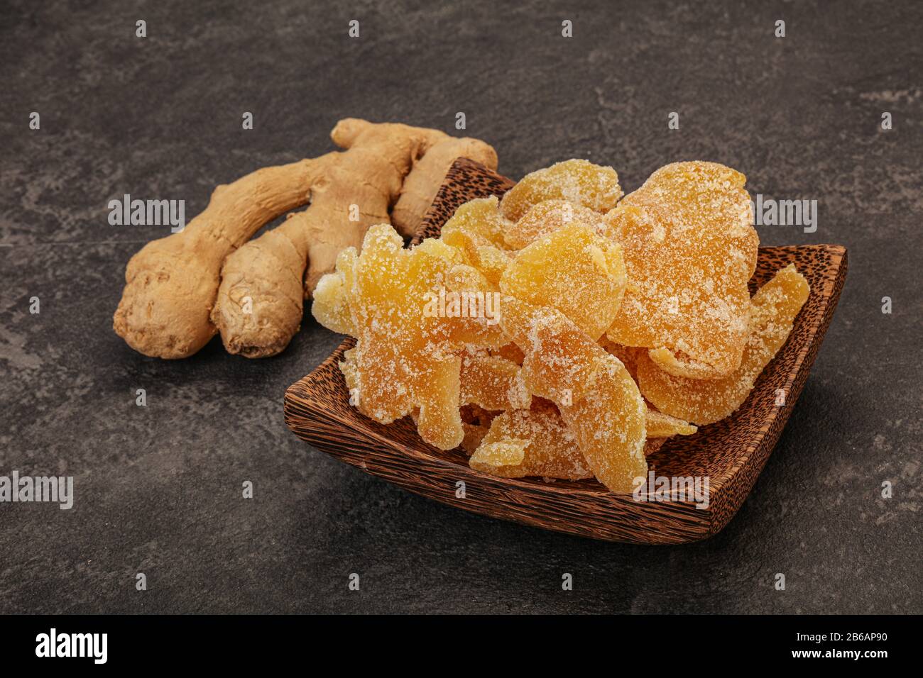 Dry sweet ginger snack in the bowl Stock Photo - Alamy