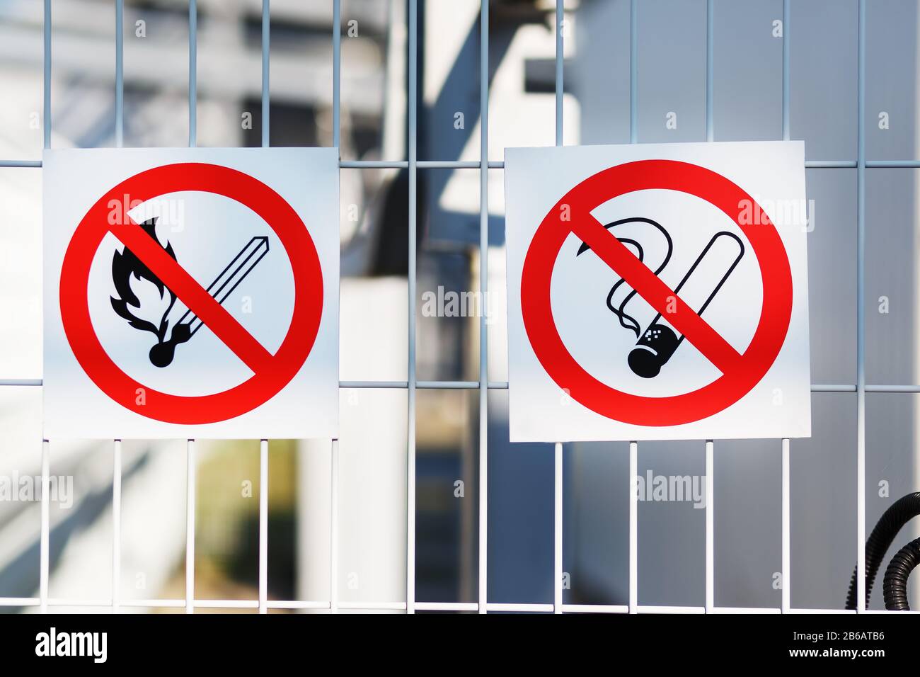 Sign Flammable on the fence of an industrial facility. Signs on the ...