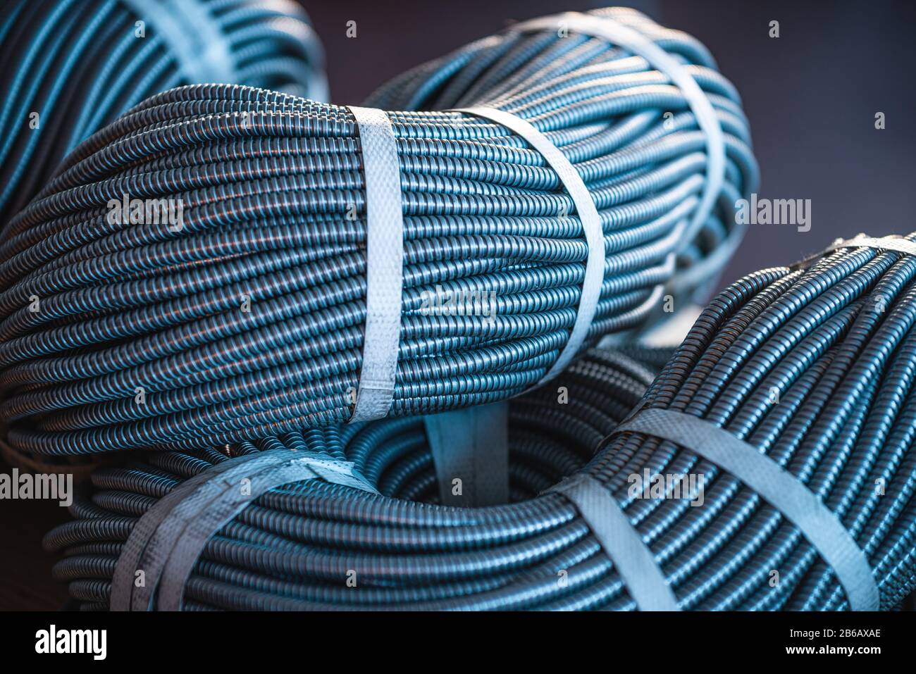 Close-up of a huge bundle of metal flexible tubes interconnected in ...