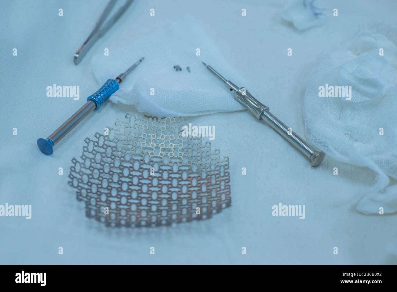 Skull clamp with pins and antiseptic solution for head fixation in ...