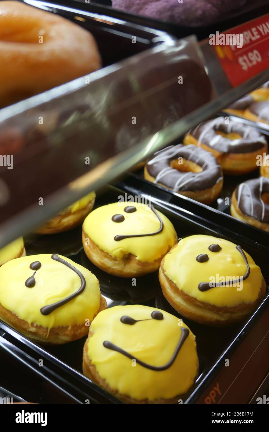 Donut display hi-res stock photography and images - Alamy