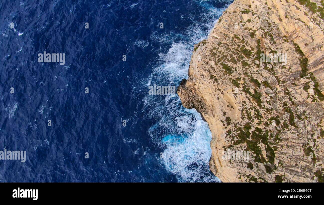 Wild Ocean water from above - Waves hitting the rocks Stock Photo - Alamy
