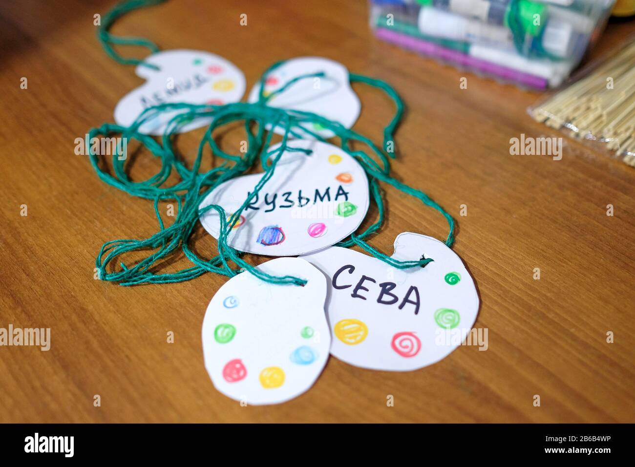 Homemade baby badges on a string. Identification of children at the ...