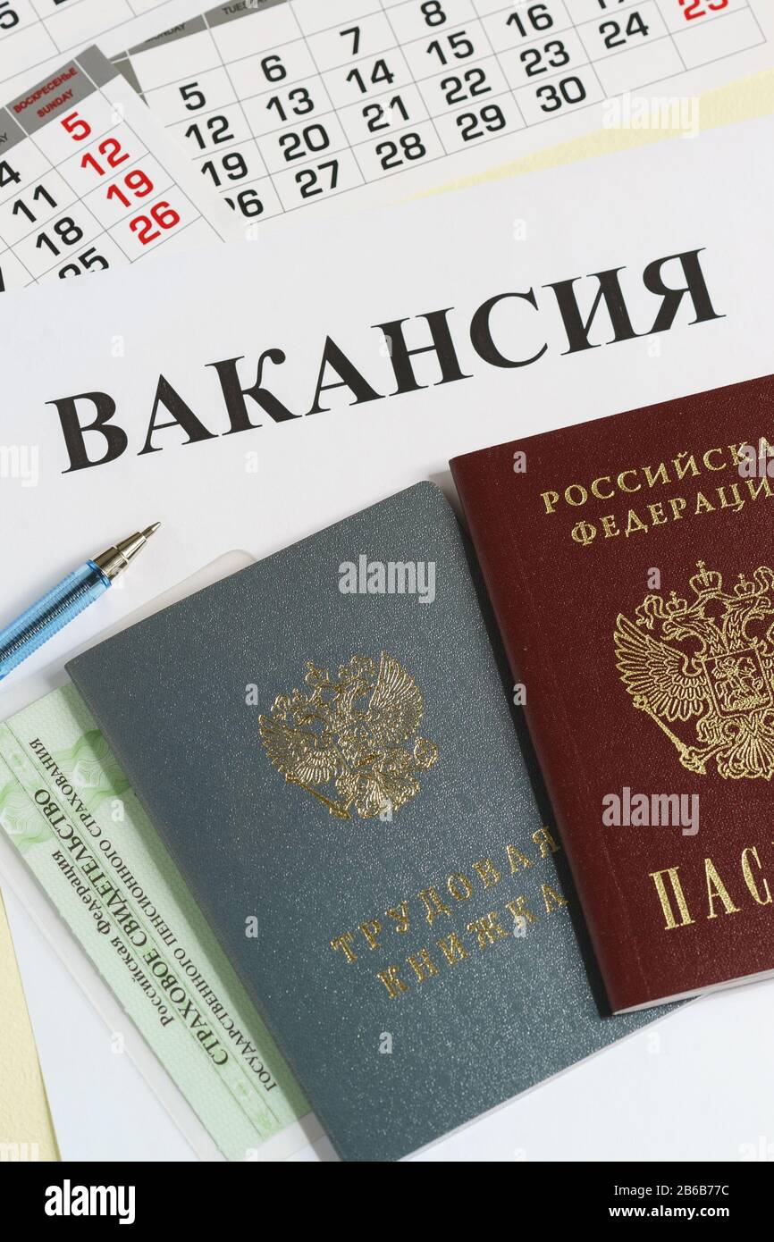 Calendar and Russian documents for employment: work book, passport and ...