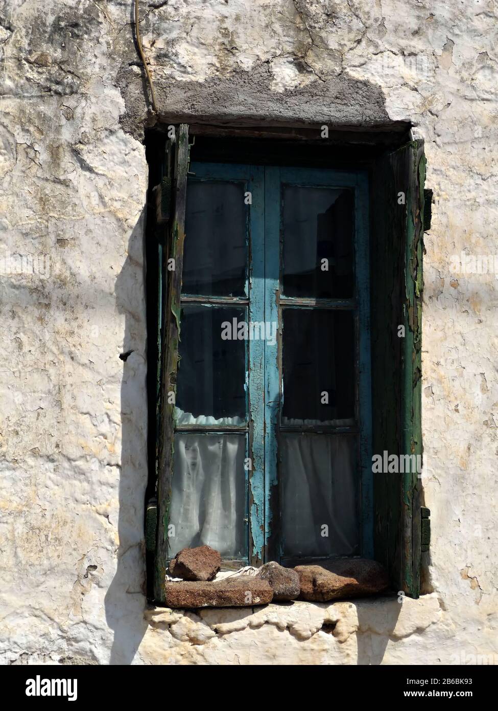 White old house with blue frame window Stock Photo - Alamy