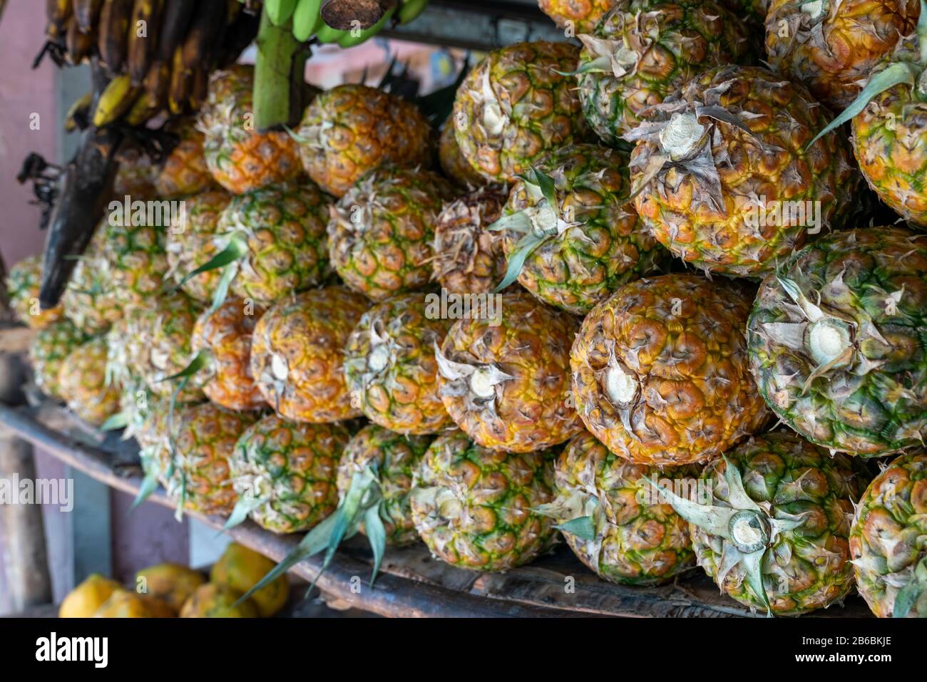 Pineapple stack at grocery on tropical marketplace outdoor,Samana ...