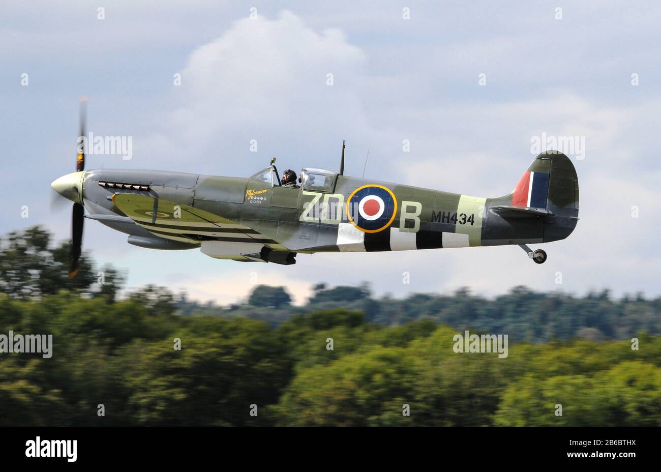 Vintage Supermarine Spitfire MH434, taking-off from Dunsfold airfield ...
