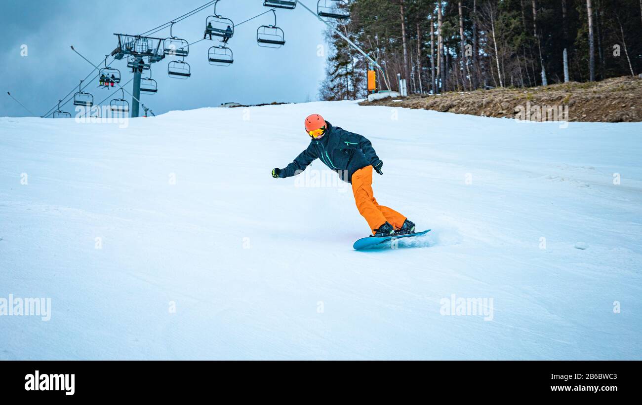 Young man on ski slope hi-res stock photography and images - Alamy