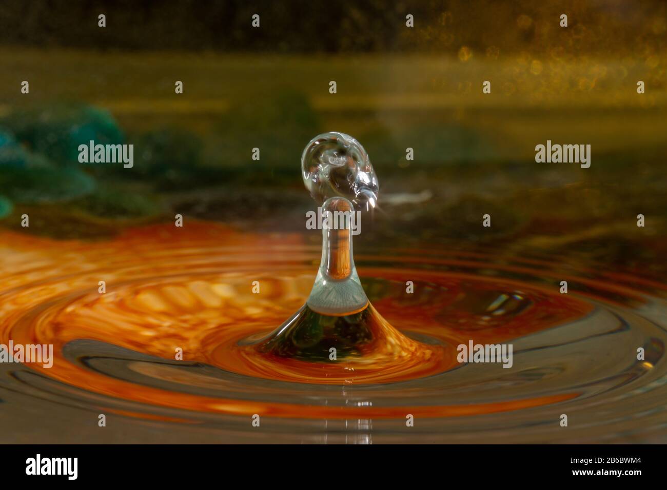 drops bouncing in the water Stock Photo - Alamy