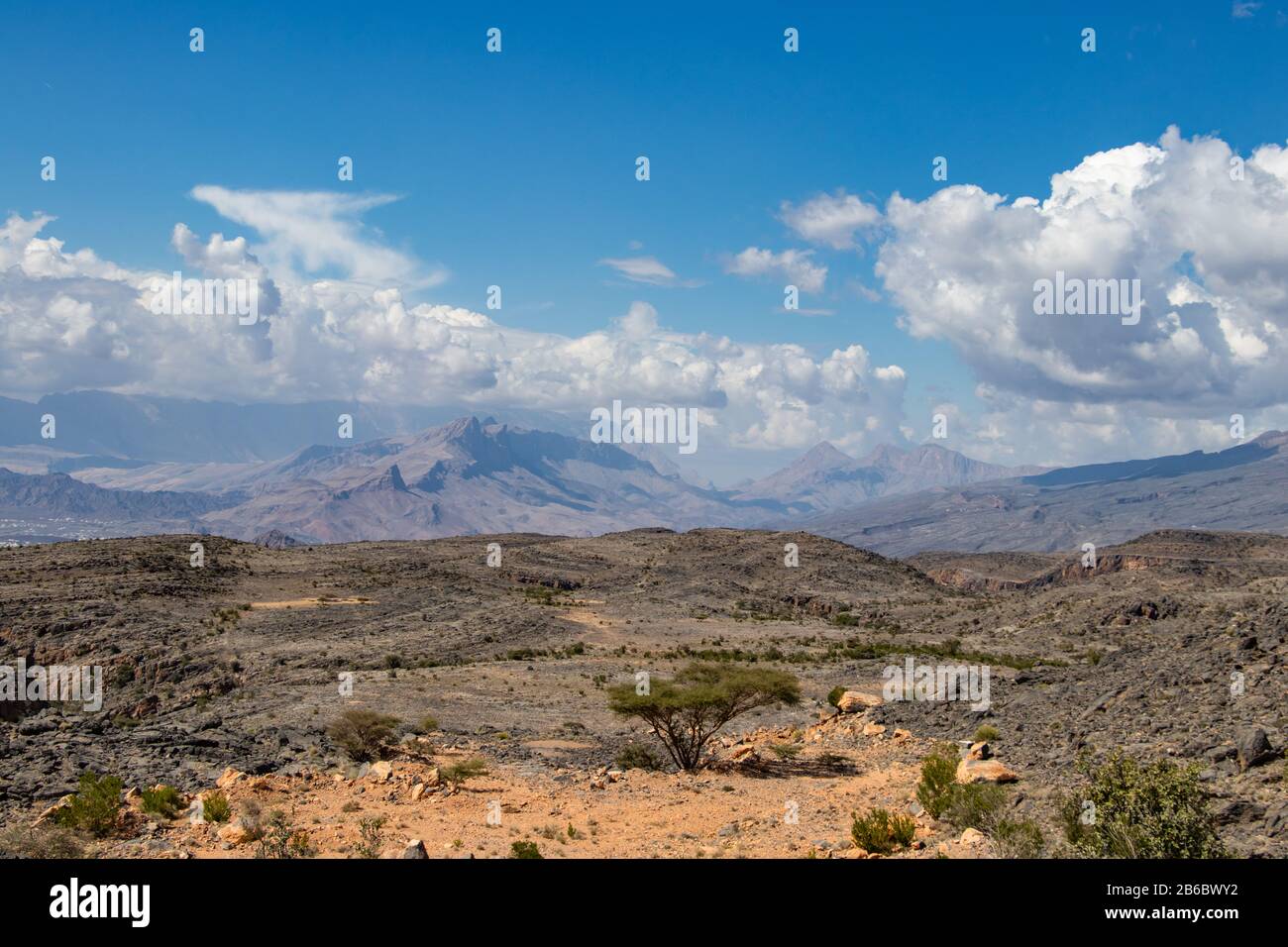 Mountain and valley view along Wadi Sahtan road in Al Hajir mountains ...