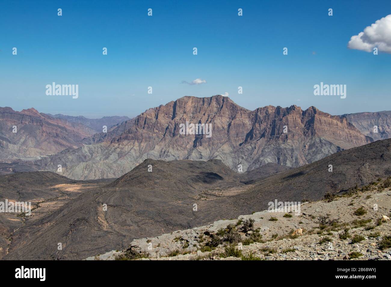 Mountain and valley view along Wadi Sahtan road in Al Hajir mountains ...