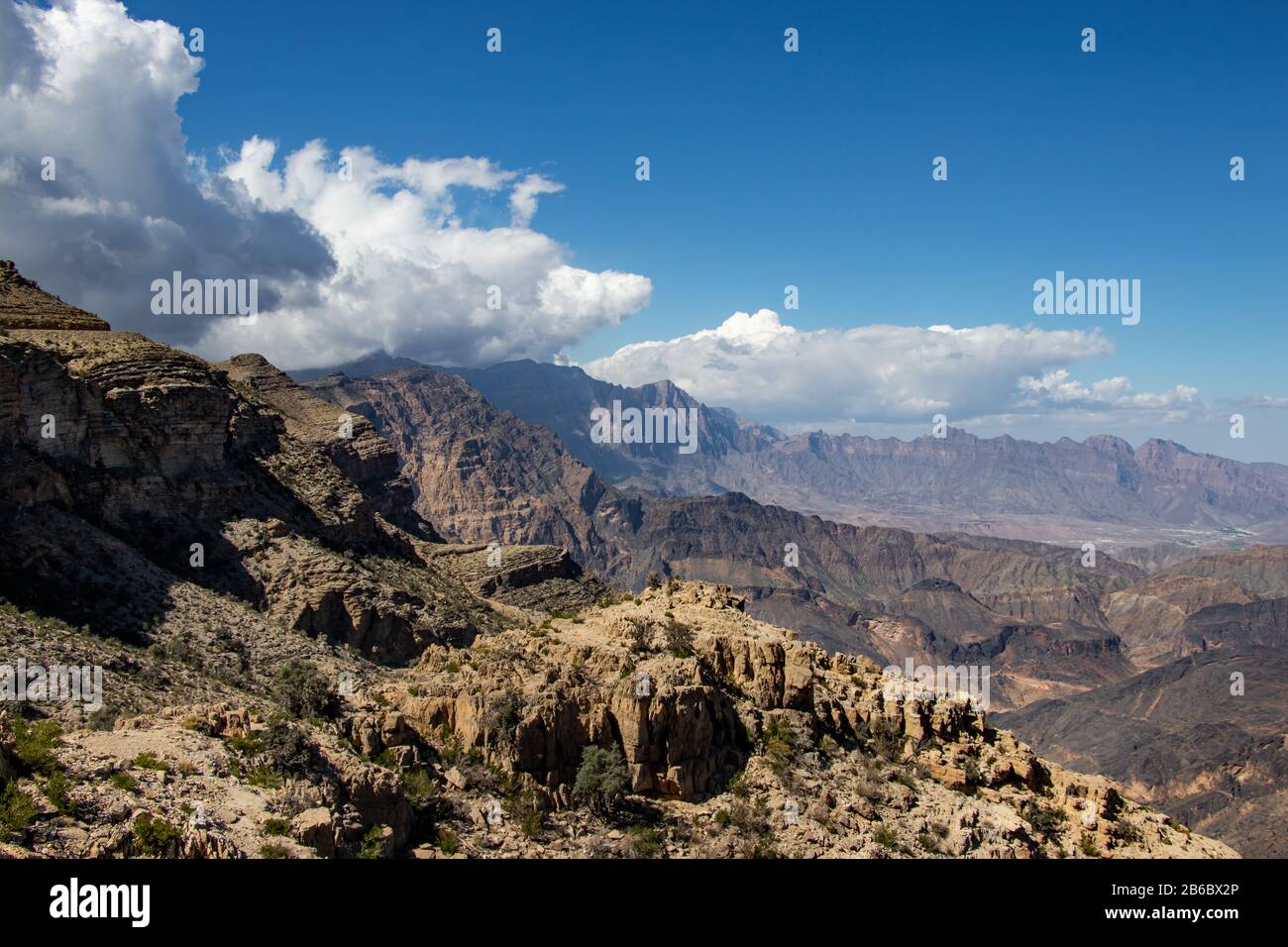 Mountain and valley view along Wadi Sahtan road in Al Hajir mountains ...