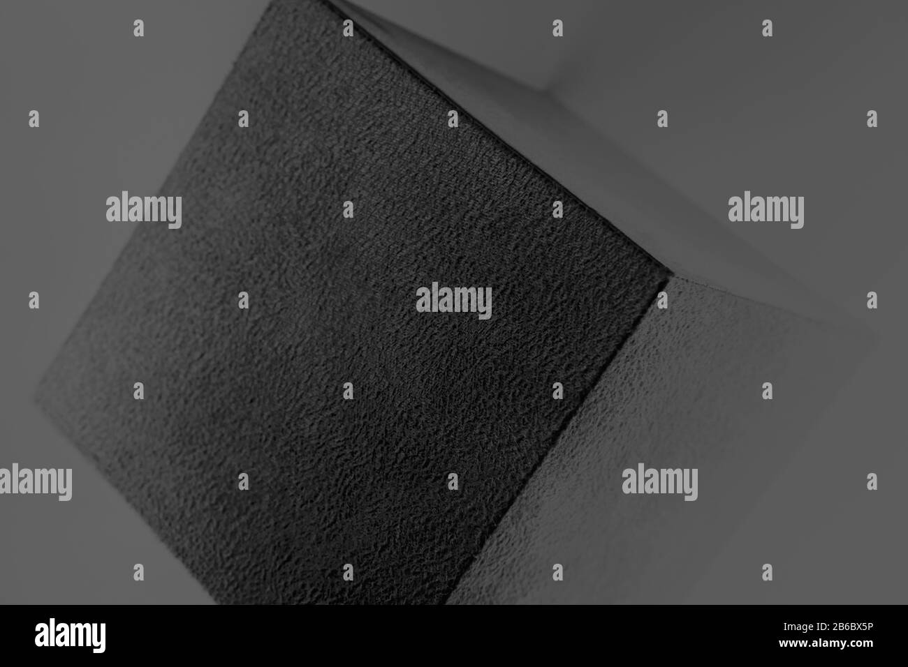 Geometric cube figure in dark background. Faded low light dark ...