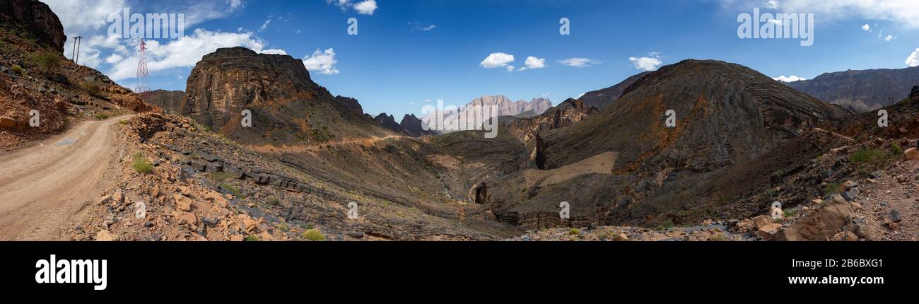 Mountain and valley view along Wadi Sahtan road and snake canyon in Al ...