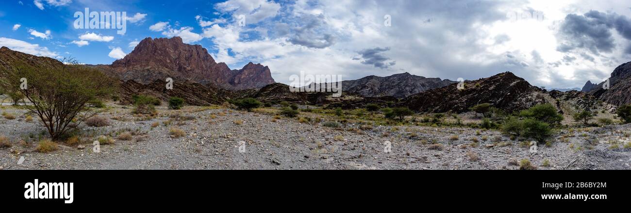 Mountain and valley view along Wadi Sahtan road and snake canyon in Al ...