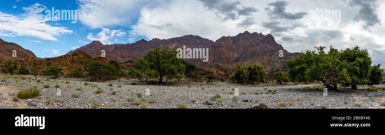 Mountain and valley view along Wadi Sahtan road and snake canyon in Al ...