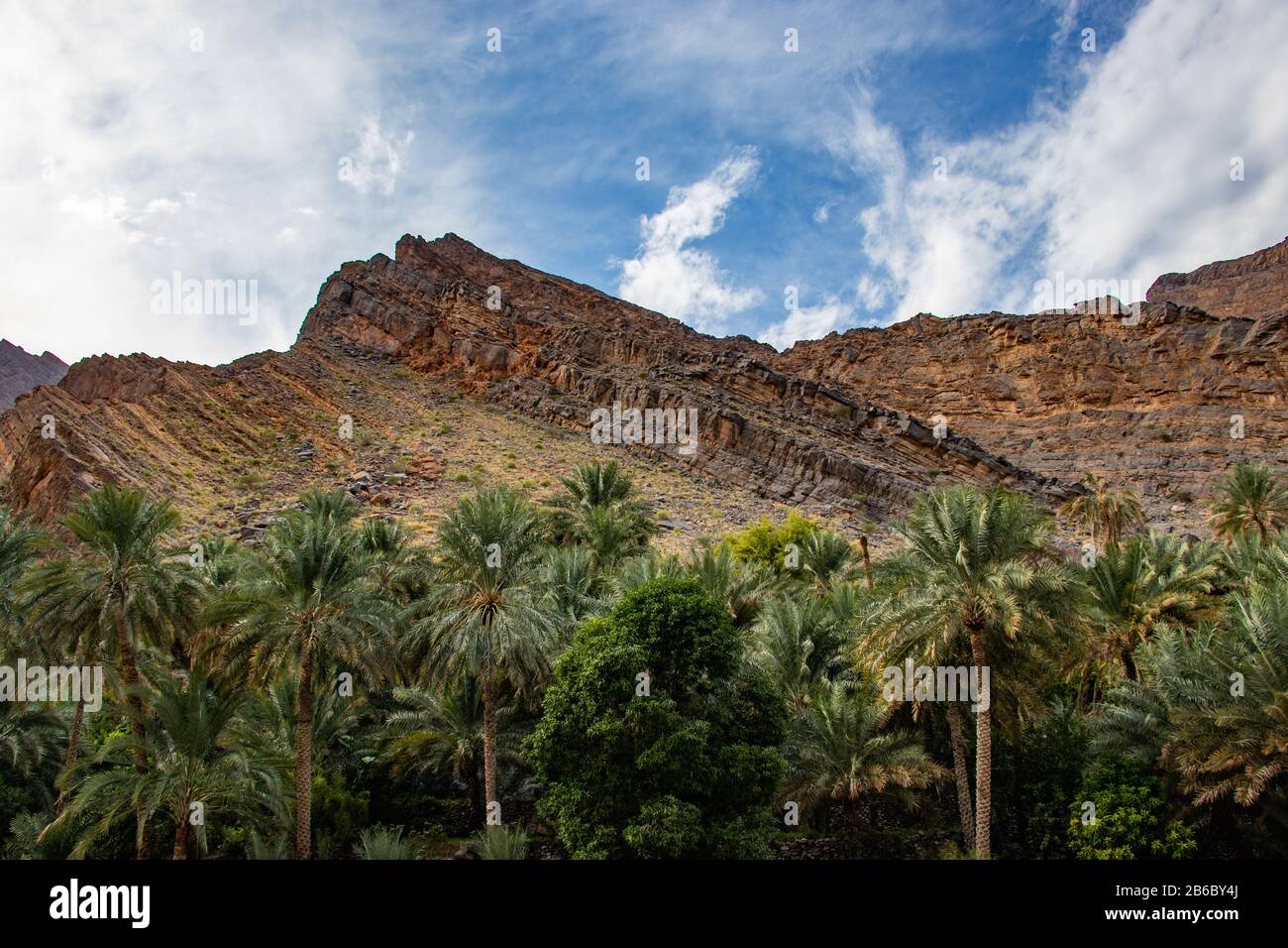 Mountain and valley view along Wadi Sahtan road and snake canyon in Al ...