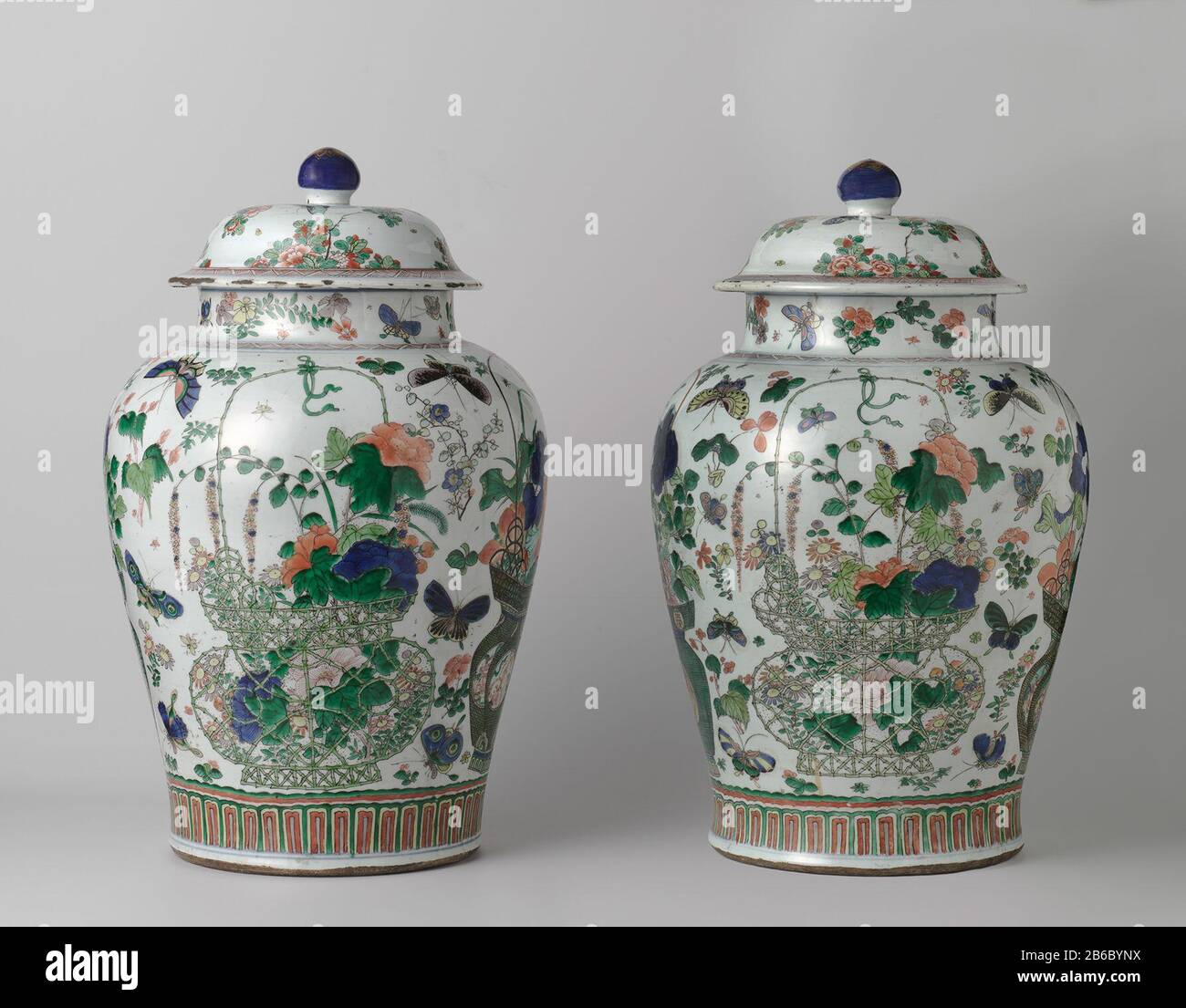 Baluster vase with cover with flower baskets, flower branches and ...