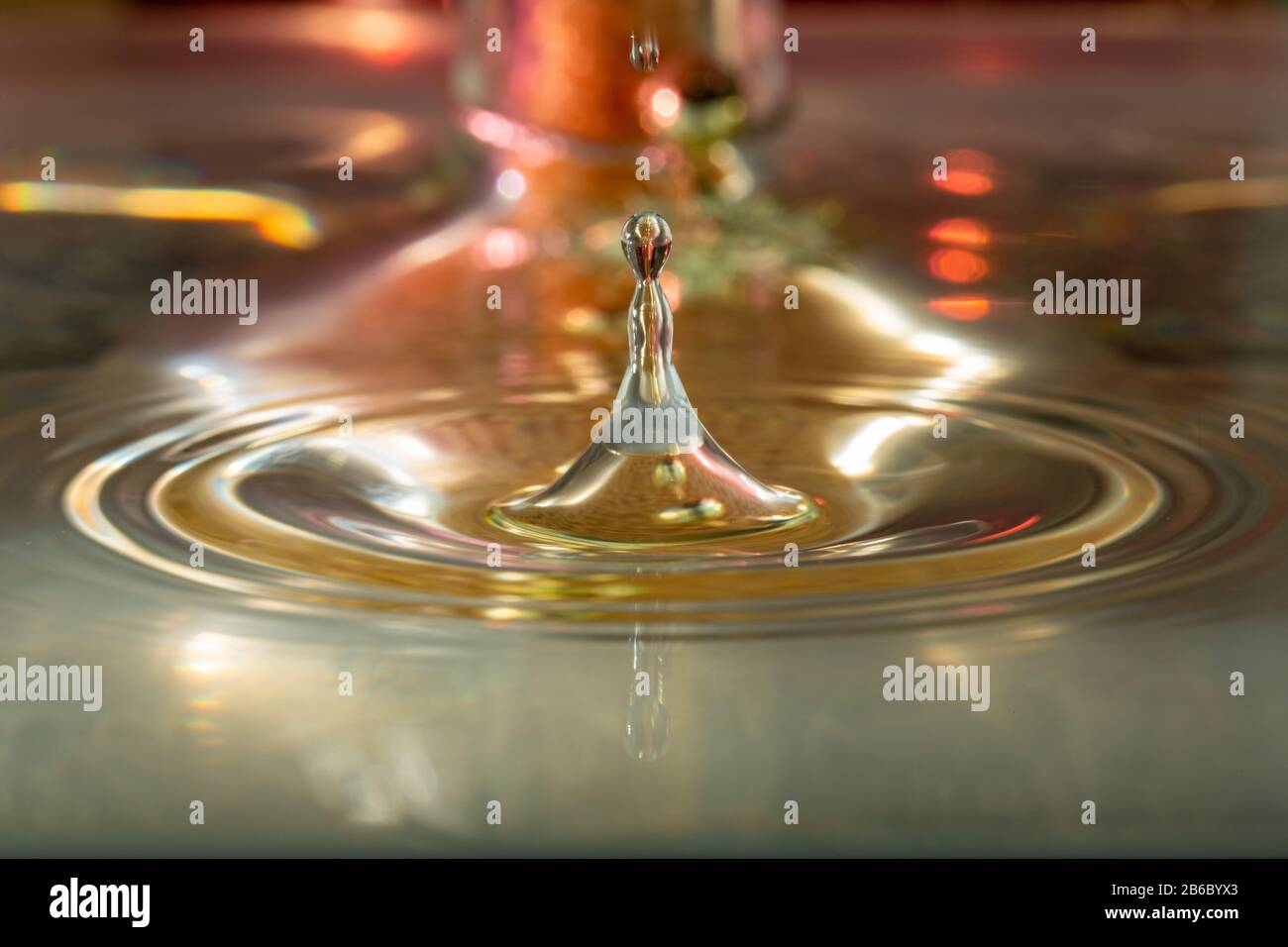 drops bouncing in the water Stock Photo - Alamy