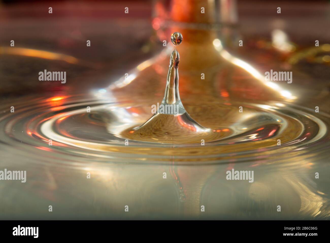drops bouncing in the water Stock Photo - Alamy