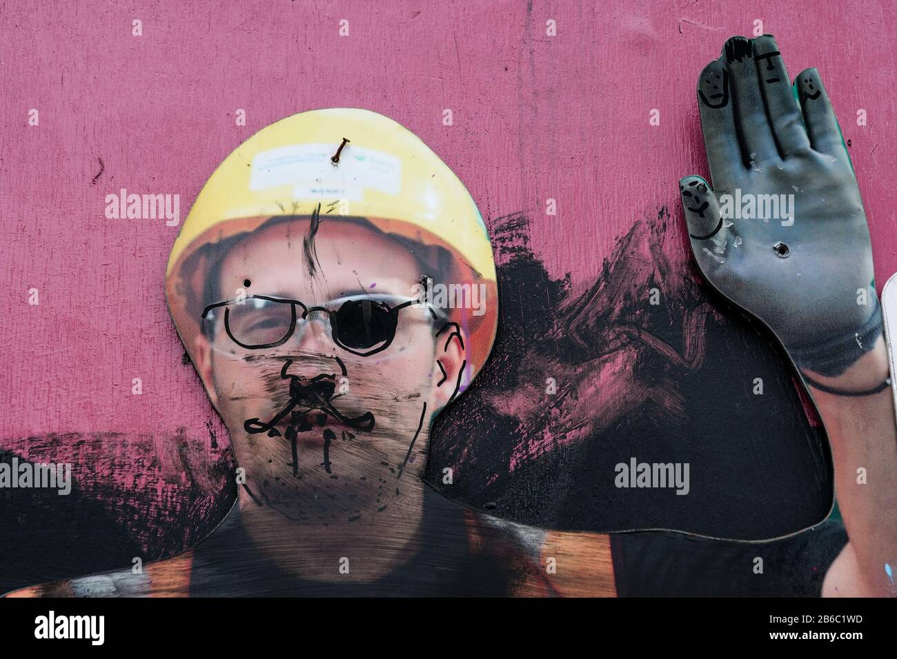 Vandalised Safety Poster Stock Photo - Alamy