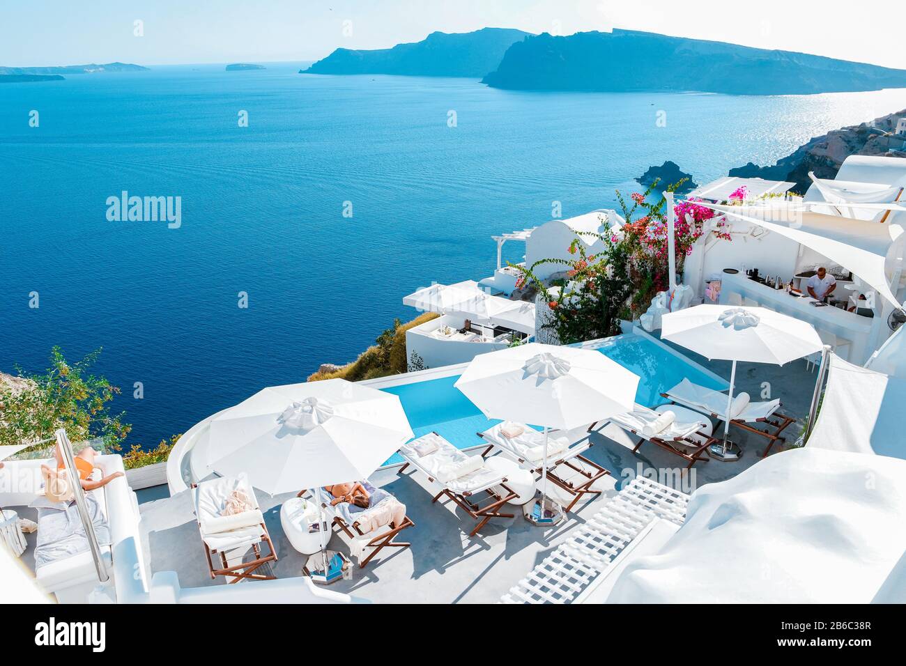 Santorini Oia village during sunset whit luxury hotels and whitewashed ...