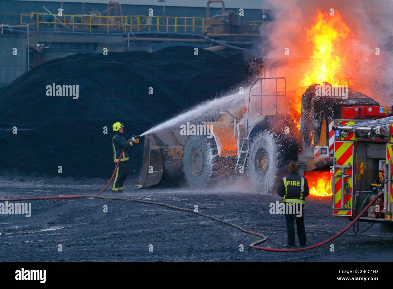 South Yorkshire Fire & Rescue attending a Caterpillar loading shovel ...