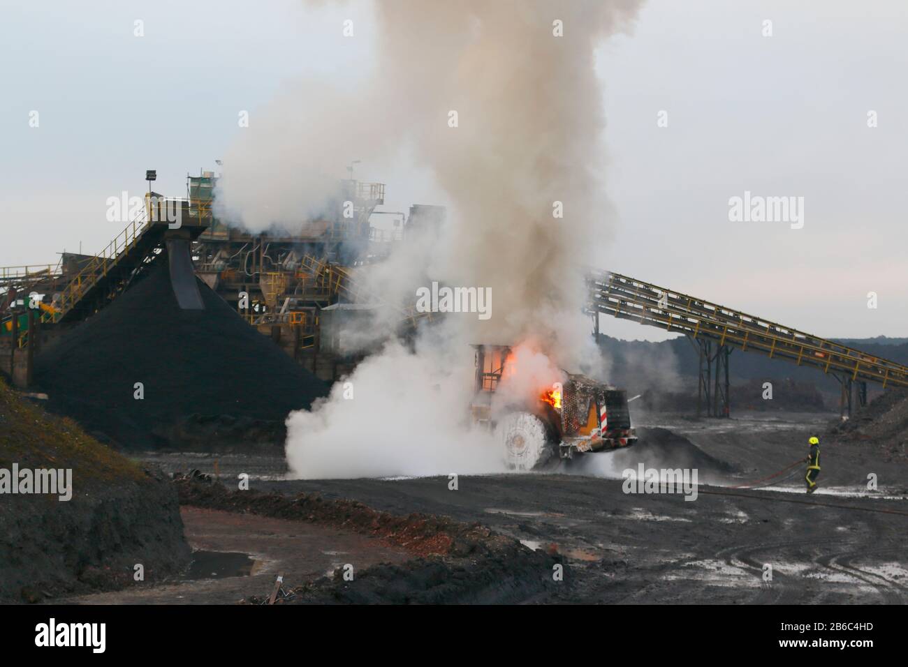 South Yorkshire Fire & Rescue attending a Caterpillar loading shovel ...