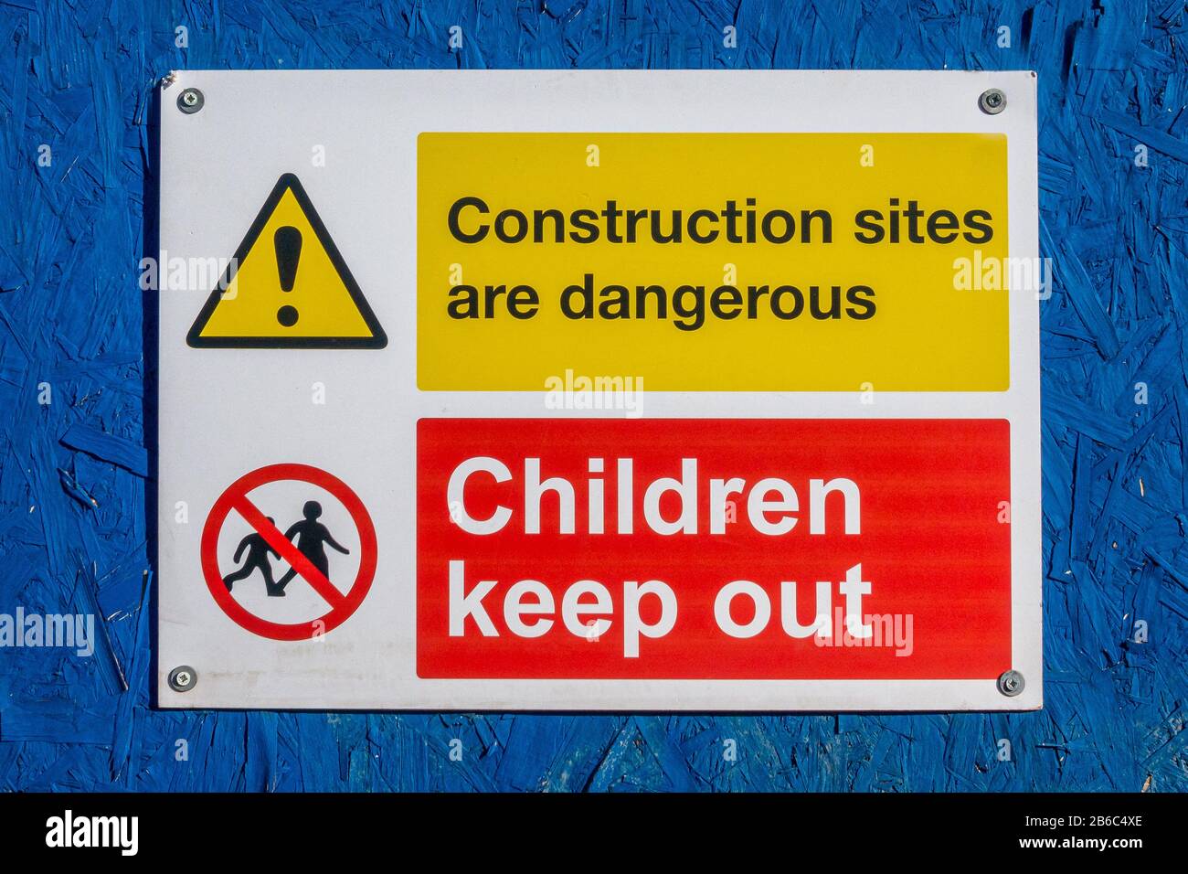 Construction sites are dangerous children keep out sign on a blue ...